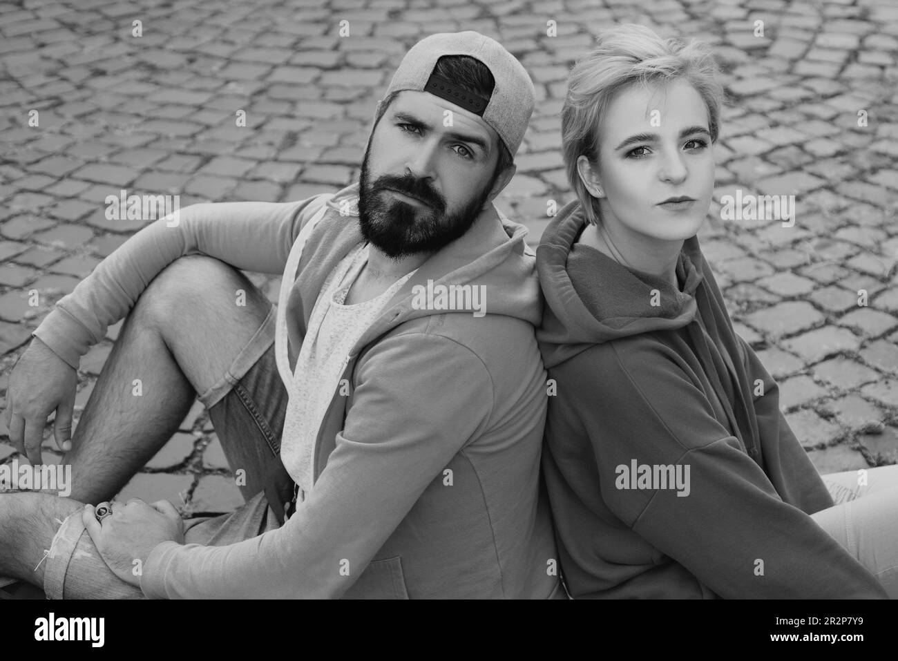 Youth fashion. Feeling free and stylish. Man and woman modern clothes ...