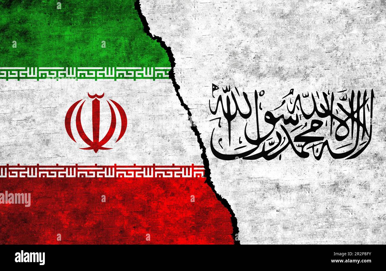 Iran and Taliban painted flags on a wall with a crack. Taliban and Iran ...