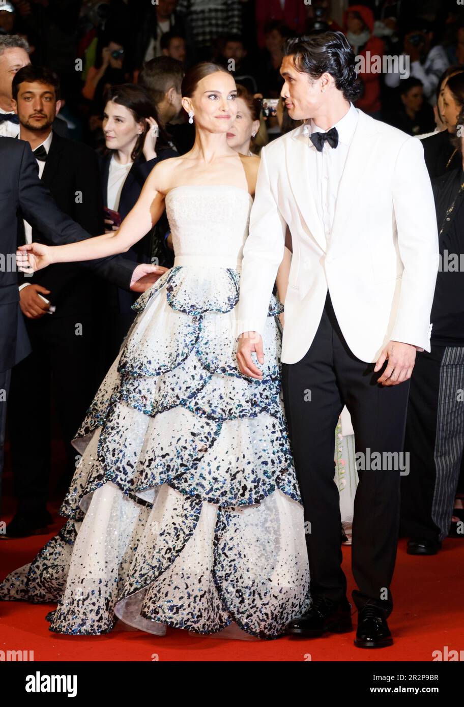 Natalie Portman, left, and Charles Melton pose for photographers upon ...