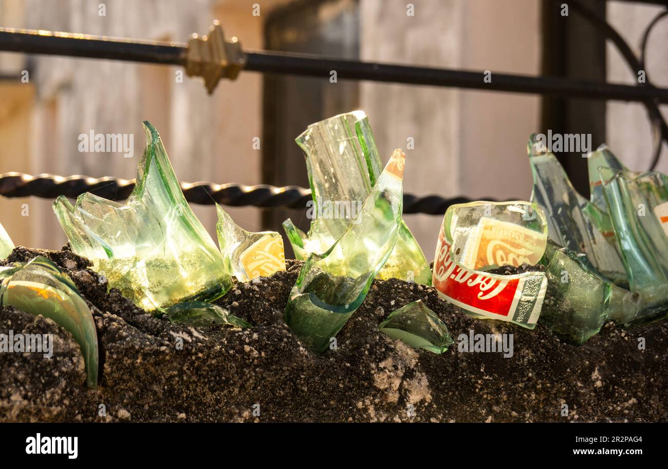 Broken glass on top of wall hi-res stock photography and images - Alamy