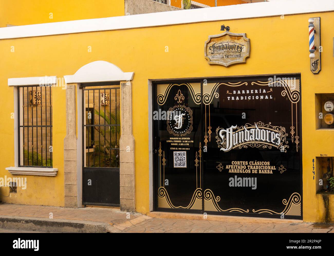 front entrance of Fundadores Barber shop in the San Juan neighborhood ...