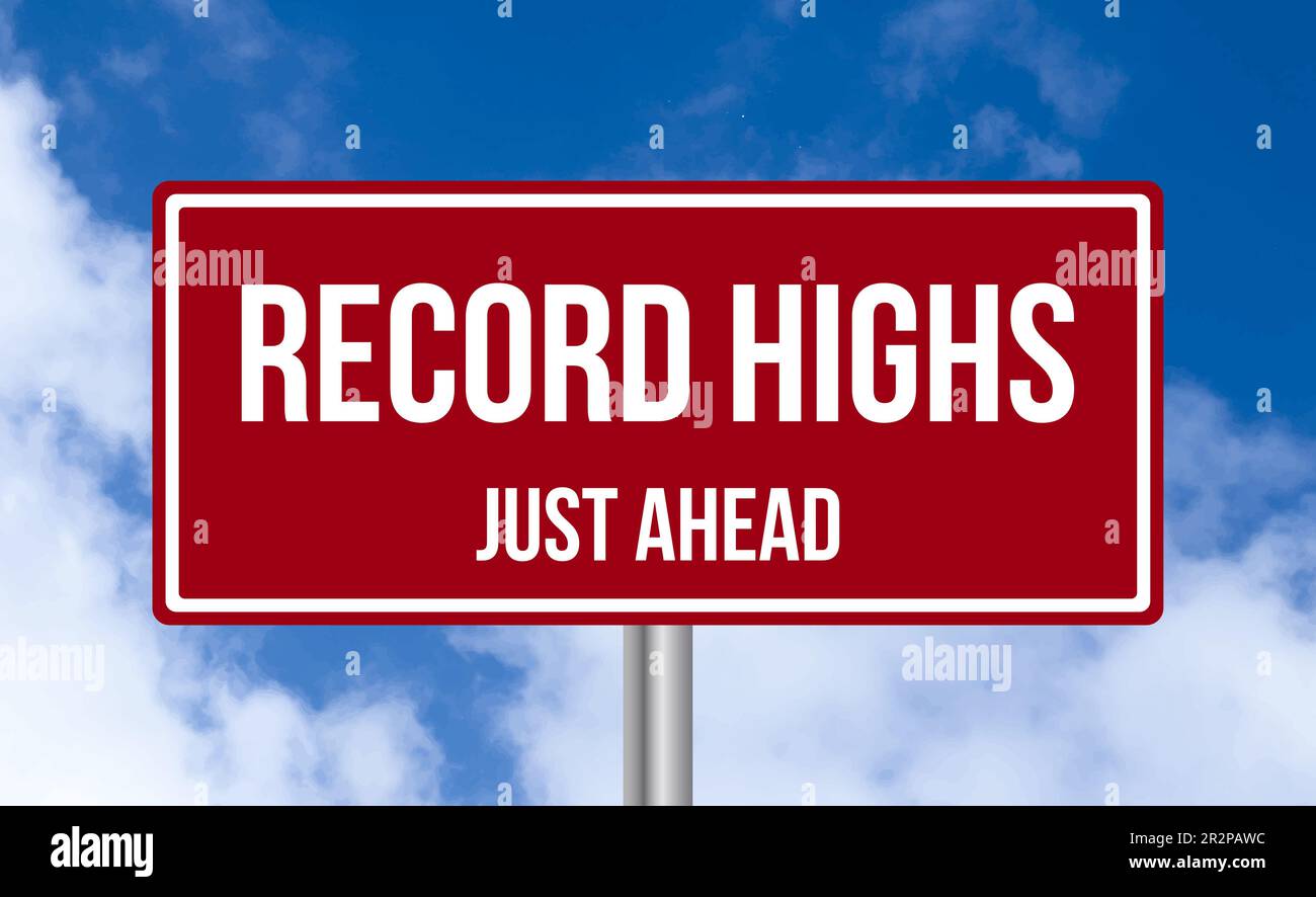 Record Highs just ahead road sign on sky background Stock Photo - Alamy