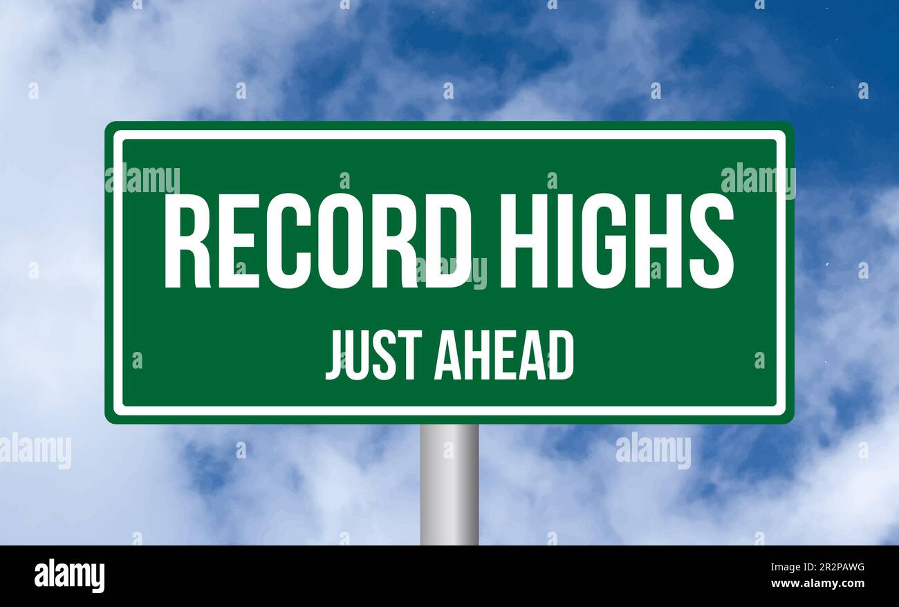 Record Highs just ahead road sign on sky background Stock Photo - Alamy