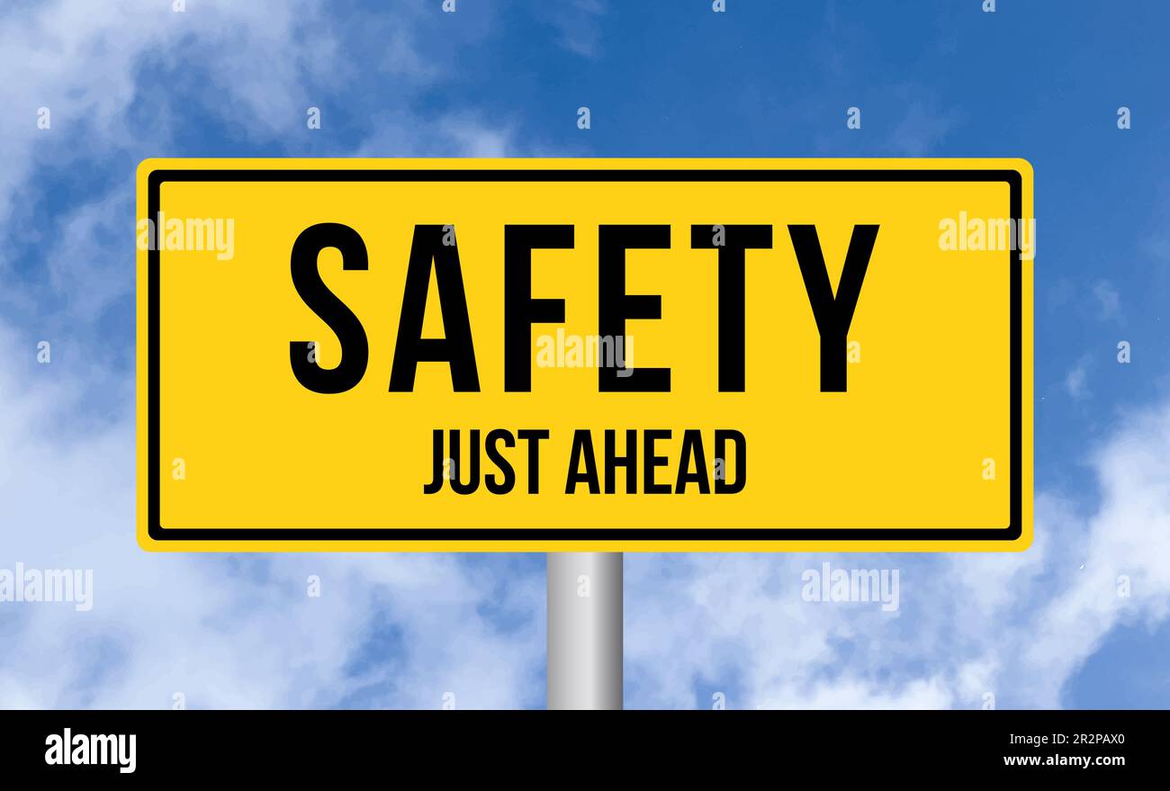 Safety just ahead road sign on sky background Stock Photo - Alamy