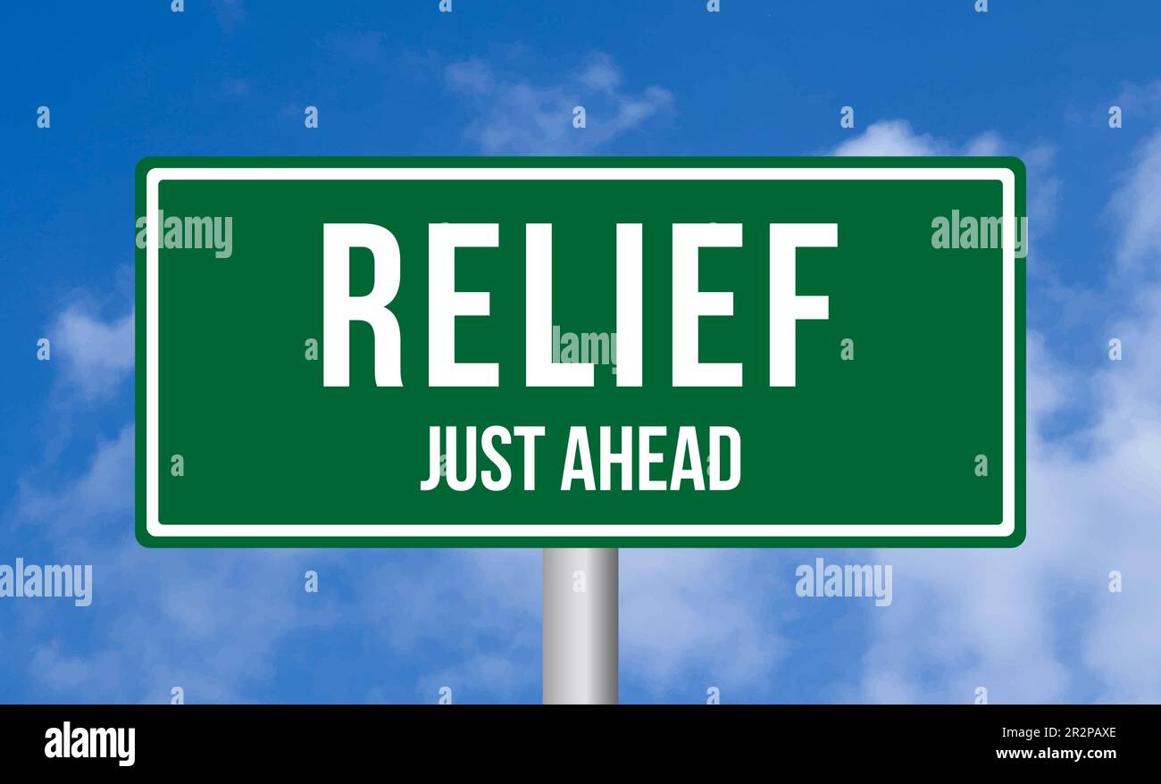 Relief just ahead road sign on cloudy sky background Stock Photo - Alamy