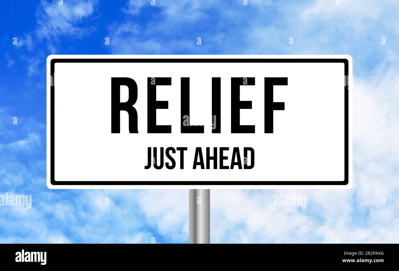 Relief just ahead road sign on cloudy sky background Stock Photo - Alamy