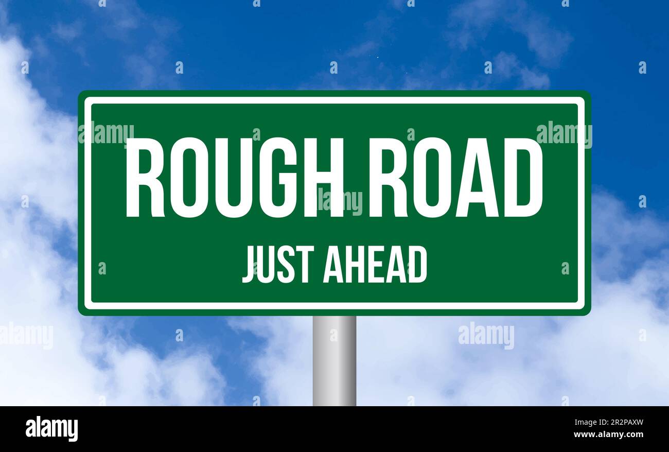 Rough Road just ahead road sign on sky background Stock Photo - Alamy