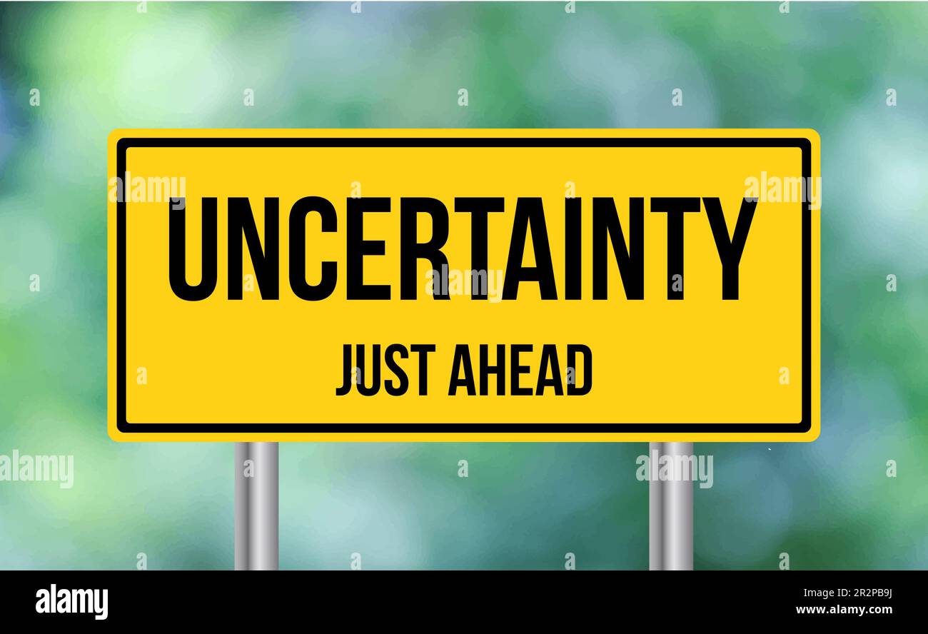 Uncertainty just ahead road sign on blur background Stock Photo - Alamy