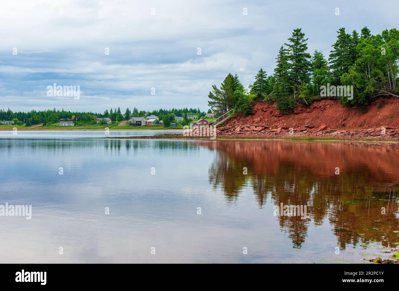 Swimming Rock - a public beach near red sandstone cliffs, on the north ...