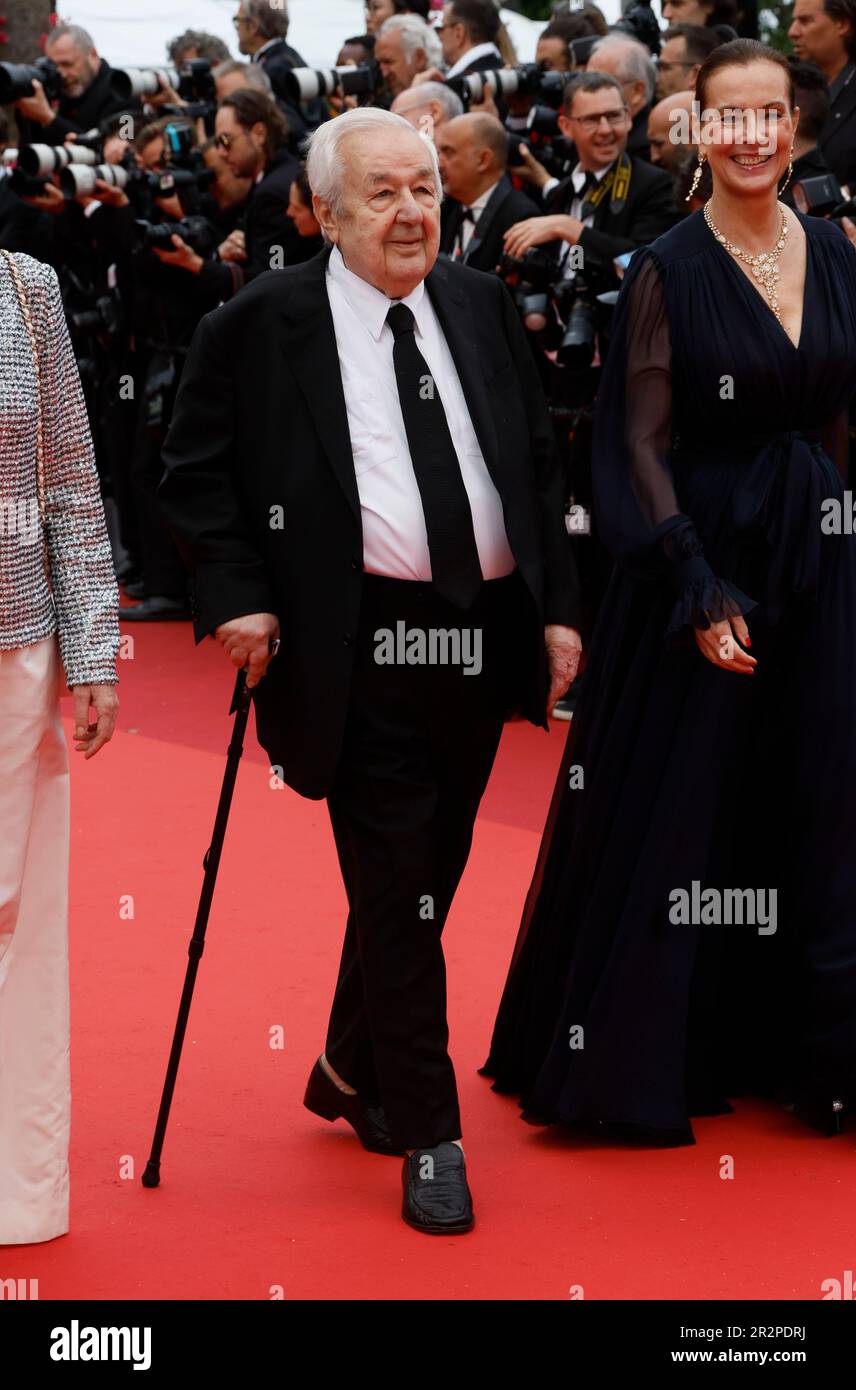 Paul Rassam, from left, and Carole Bouquet pose for photographers upon ...