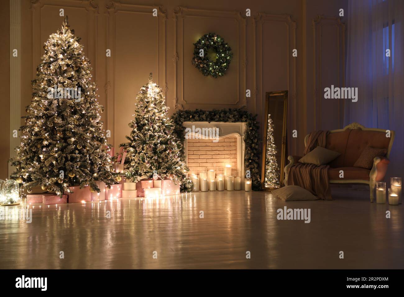 Festive room interior with beautiful Christmas trees Stock Photo - Alamy