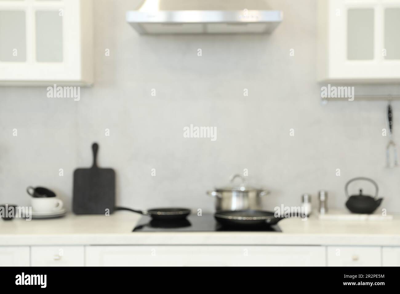 Blurred view of modern kitchen. Interior design Stock Photo - Alamy
