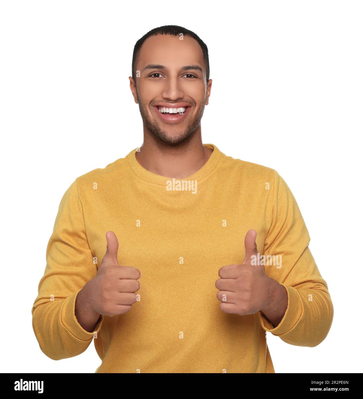 Smiling African American man showing thumbs up on white background ...