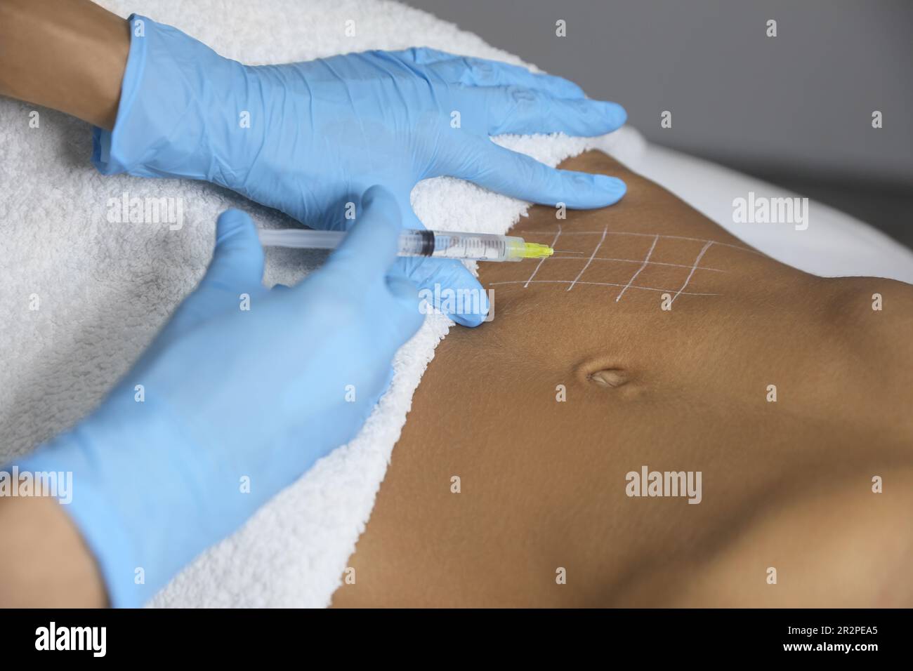 Syringe doctor belly hi-res stock photography and images - Alamy