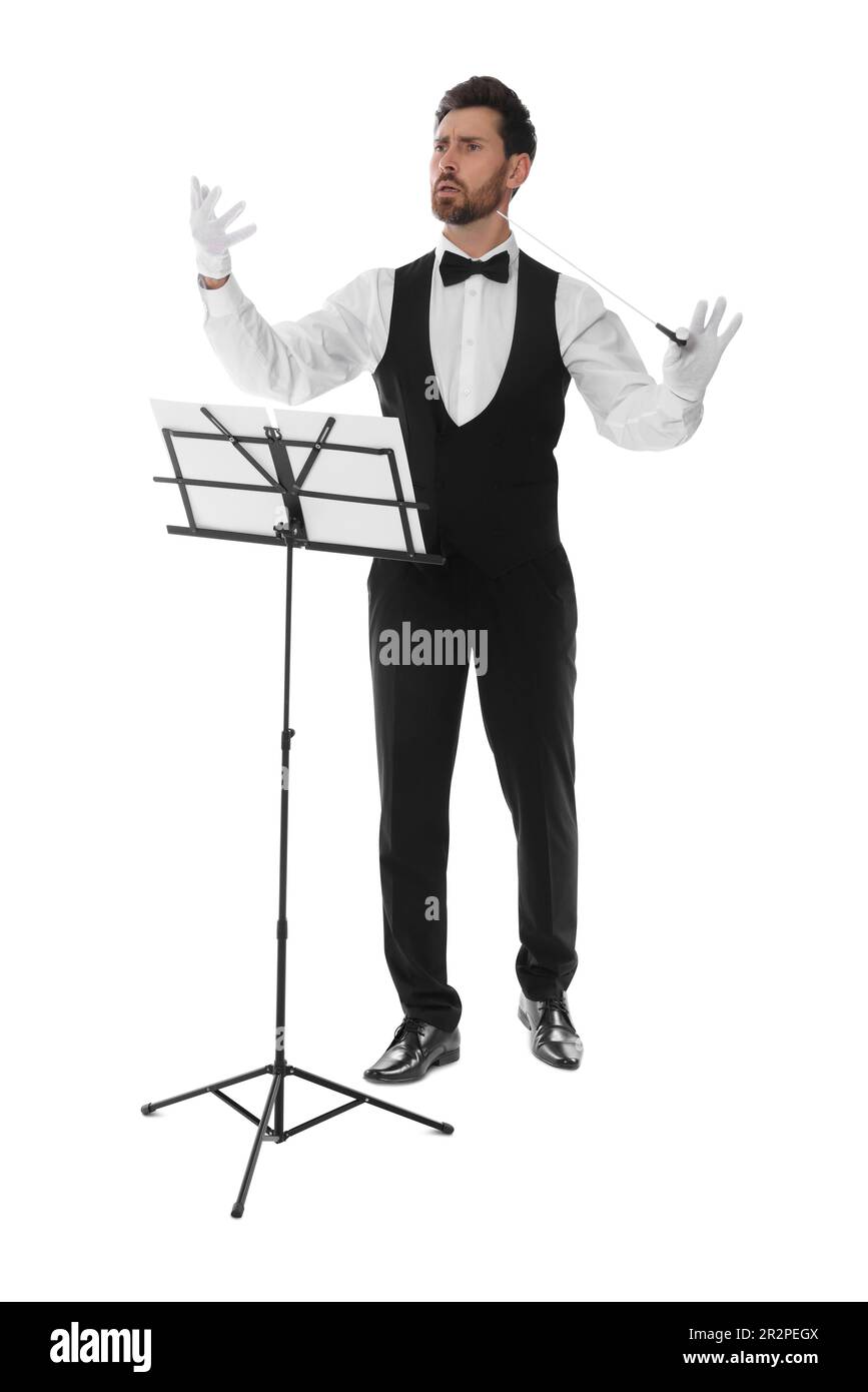 Professional conductor with baton and note stand on white background ...