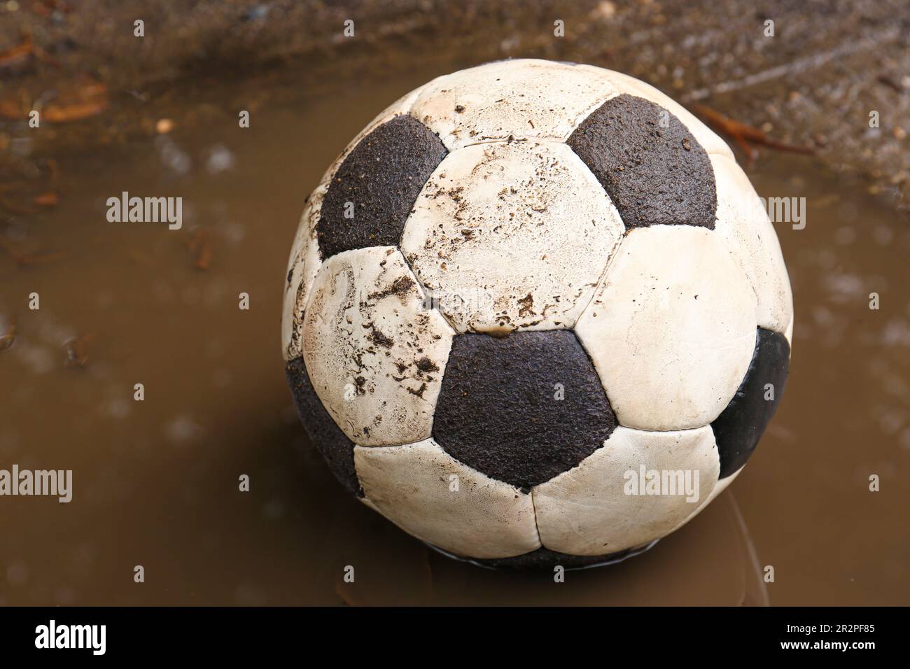 Muddy wet football ground hi-res stock photography and images - Alamy