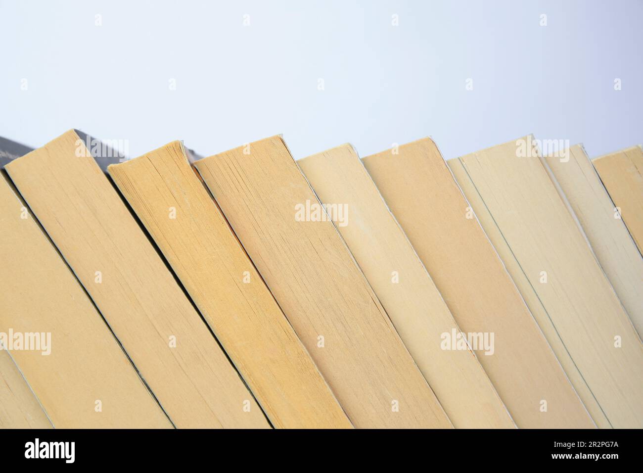 Collection of different books on light background Stock Photo - Alamy