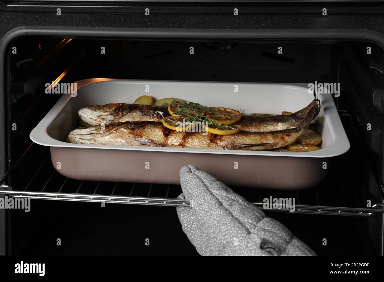 Oven baked seabass hi-res stock photography and images - Alamy