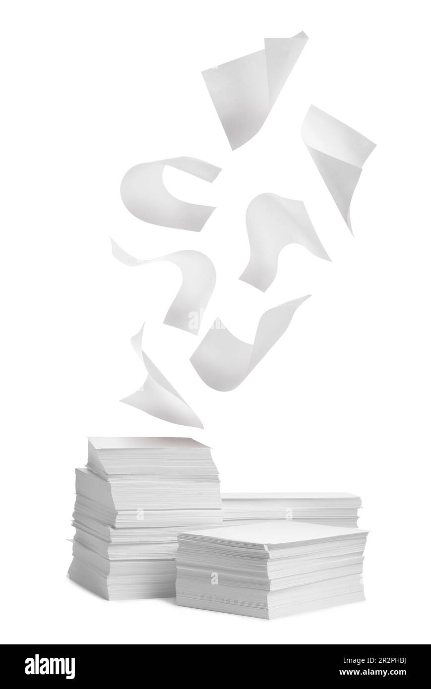 Sheets of paper falling onto stacked ones on white background Stock ...