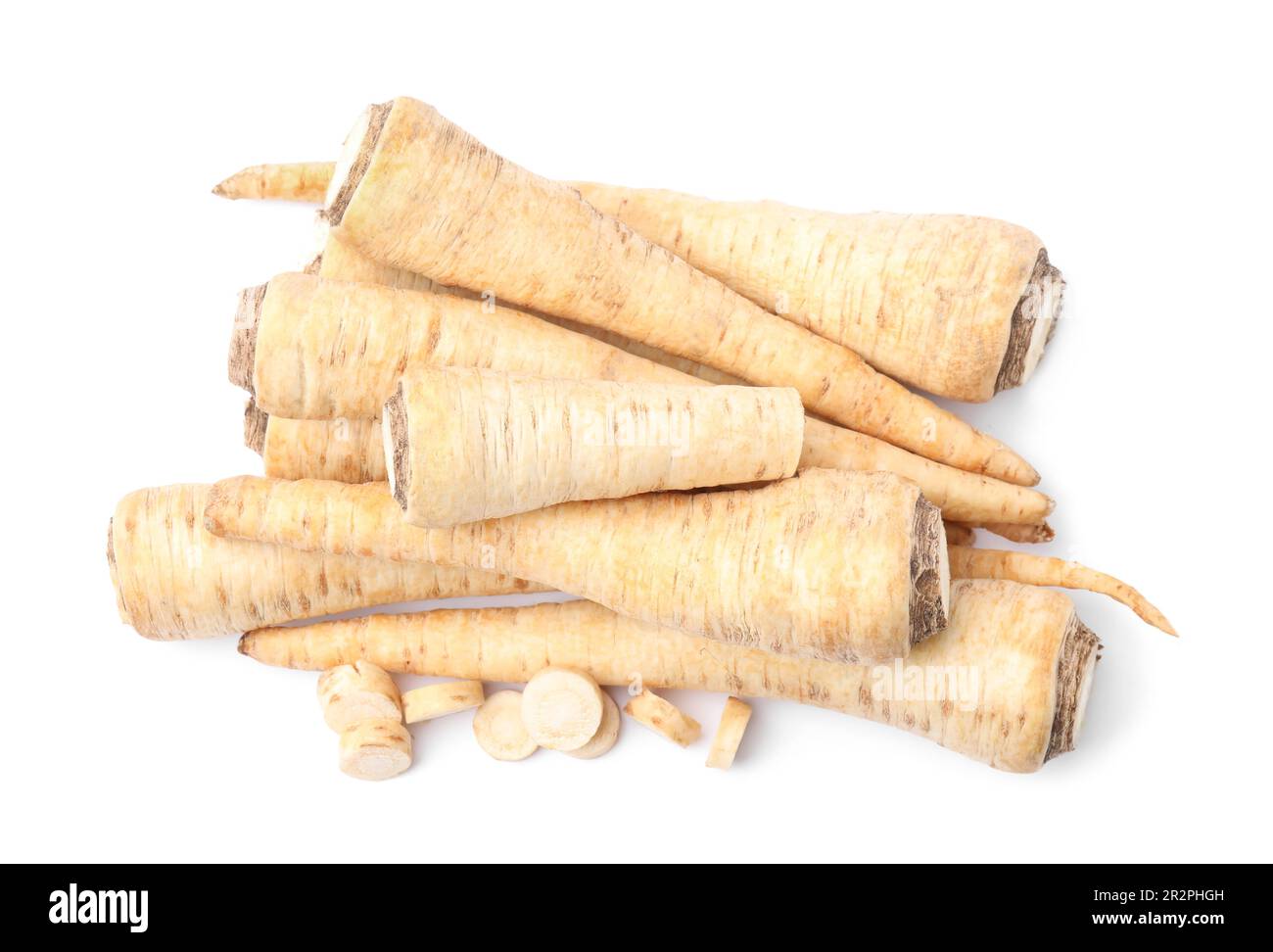 Raw parsley roots isolated on white, top view Stock Photo - Alamy