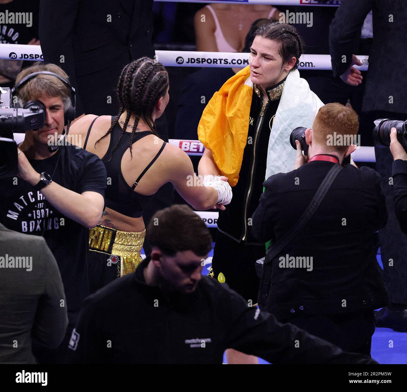 Katie Taylor (right) shakes hands with Chantelle Cameron after defeat ...