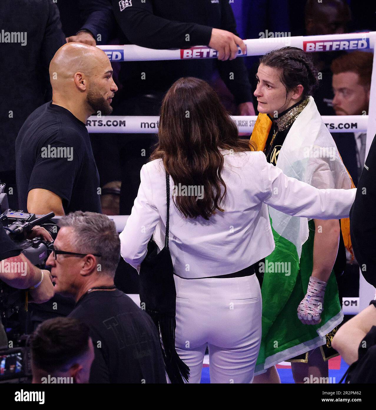 Katie Taylor with her coach Ross Enamait after defeat to Chantelle ...