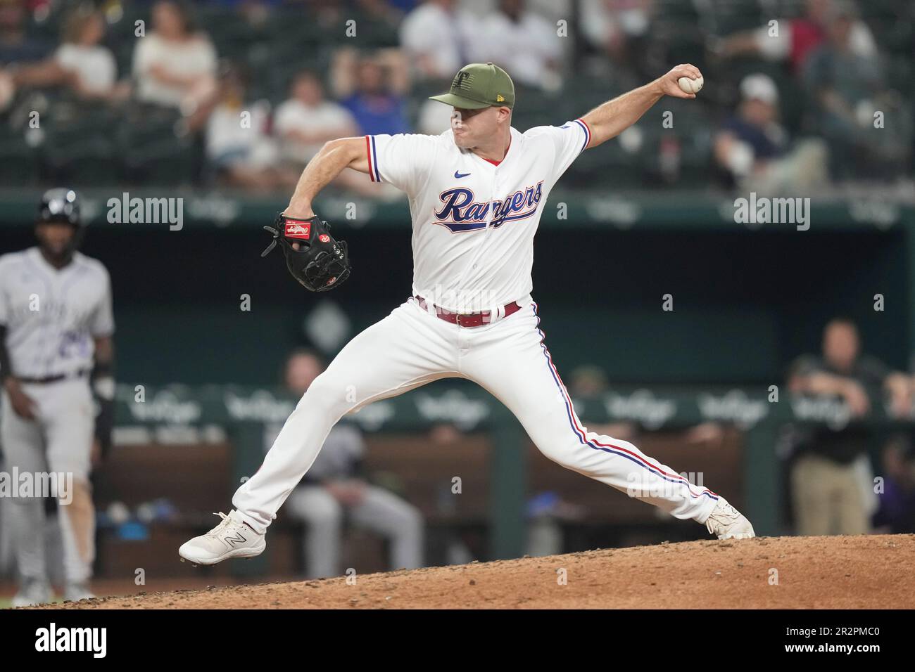 Texas Rangers closing pitcher John King throws during the 9th inning of ...