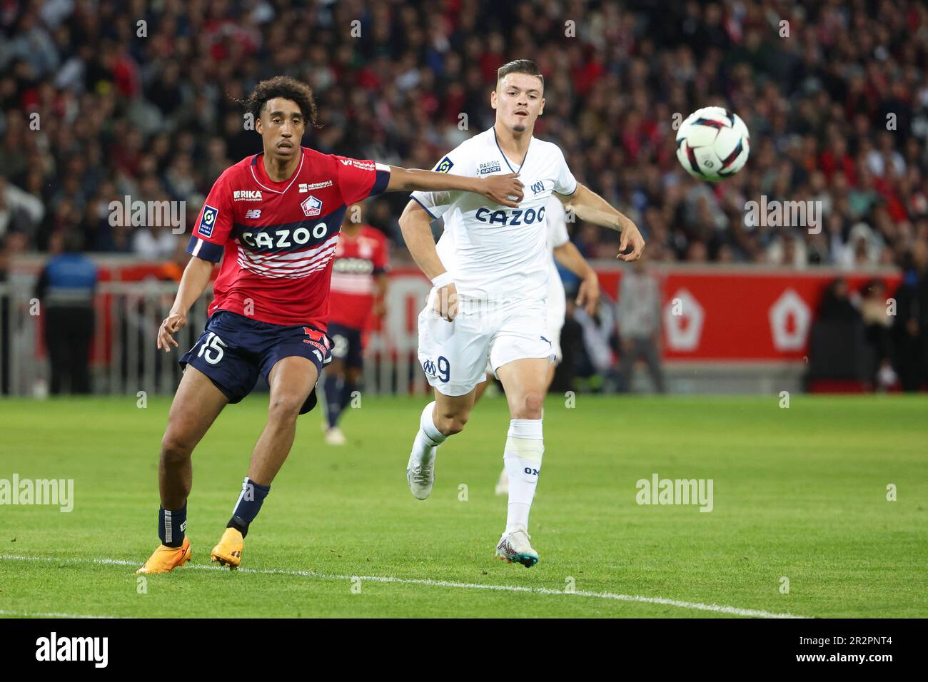 Leny Yoro of Lille, Vitinha aka Vitor Oliveira of Marseille during the French championship Ligue ...