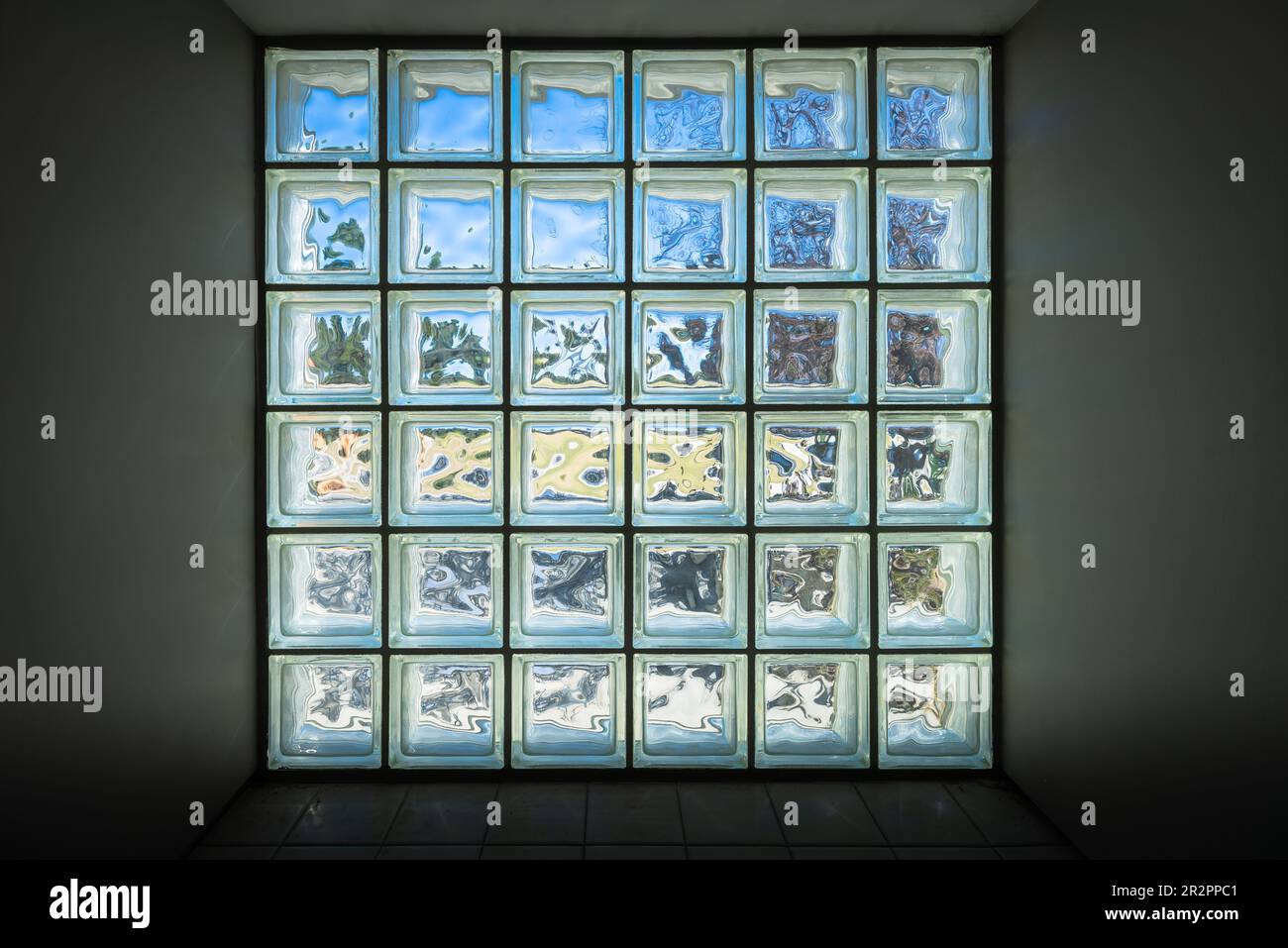 Add illumination and interest to a room with a square glass block ...