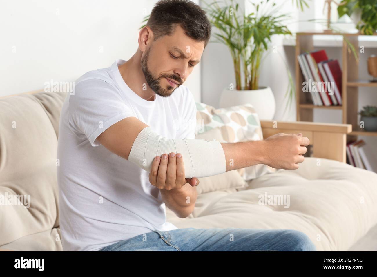 Arm wrapped hi-res stock photography and images - Alamy