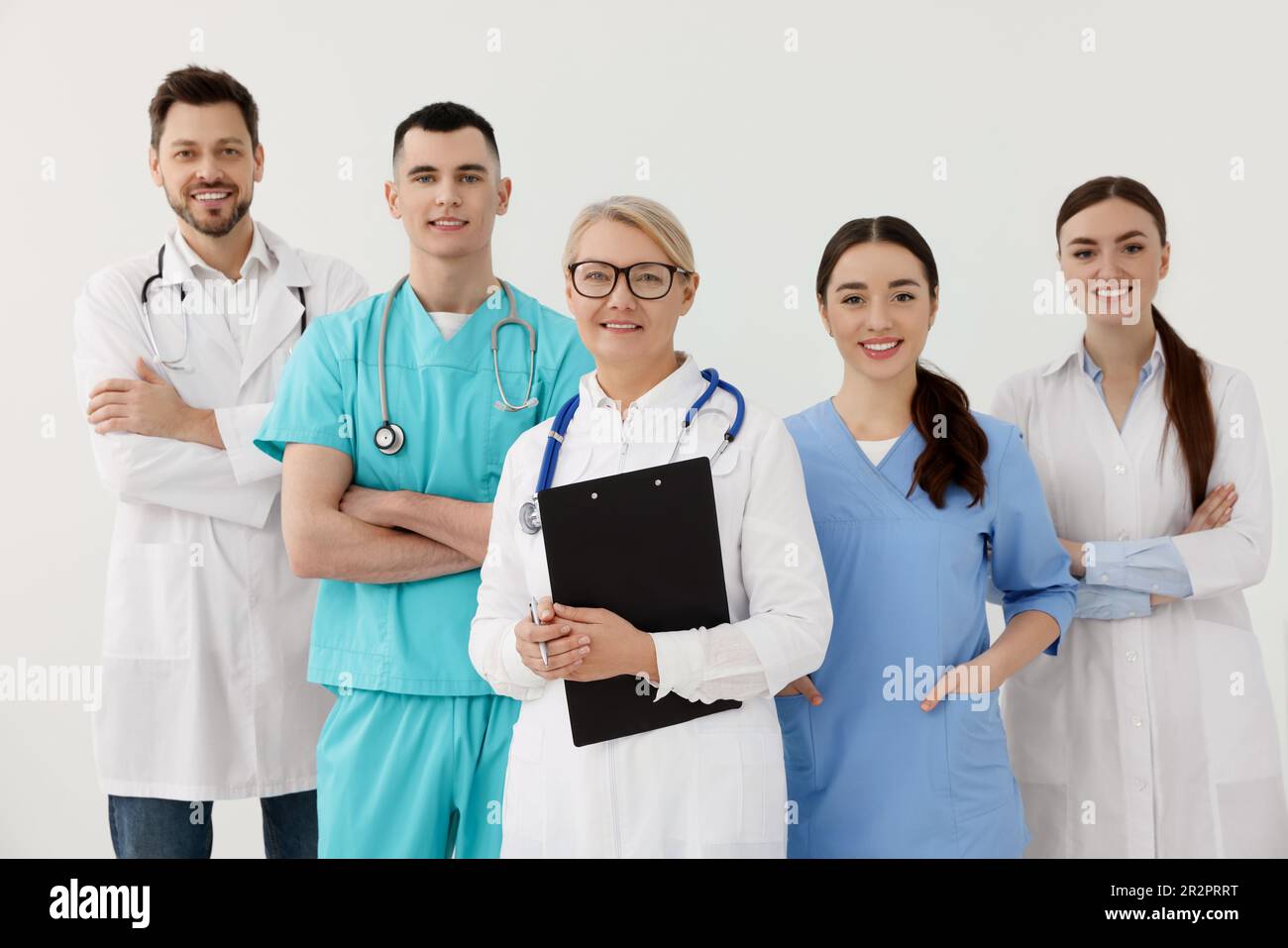 Portrait of medical doctors wearing uniforms indoors Stock Photo - Alamy