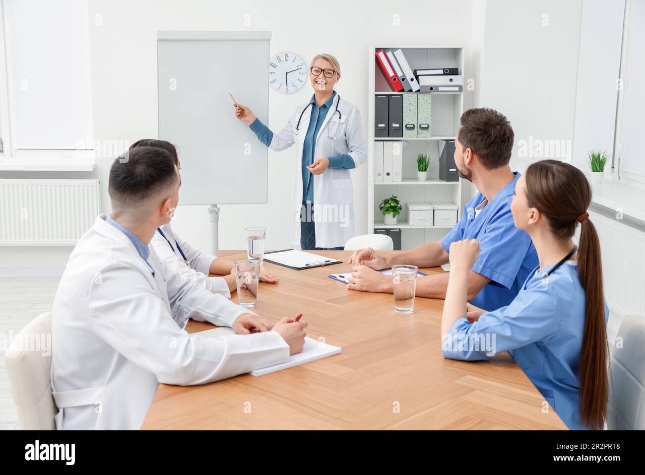 Doctor giving lecture near hi-res stock photography and images - Alamy