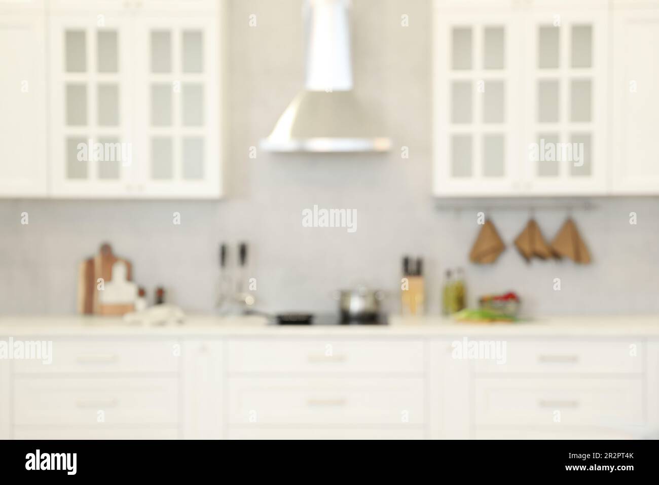 Blurred view of modern kitchen. Interior design Stock Photo - Alamy