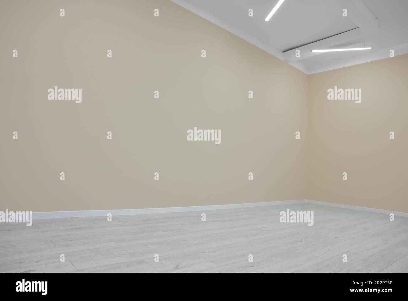 Empty renovated room with clean beige walls Stock Photo - Alamy Empty renovated room with clean beige walls Stock Photo - Alamy