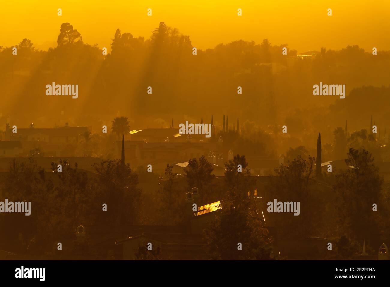 Sun through atmospheric fog in the foothills Stock Photo - Alamy