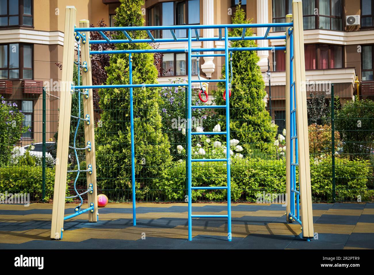 Empty monkey bars on outdoor children's playground in residential area ...