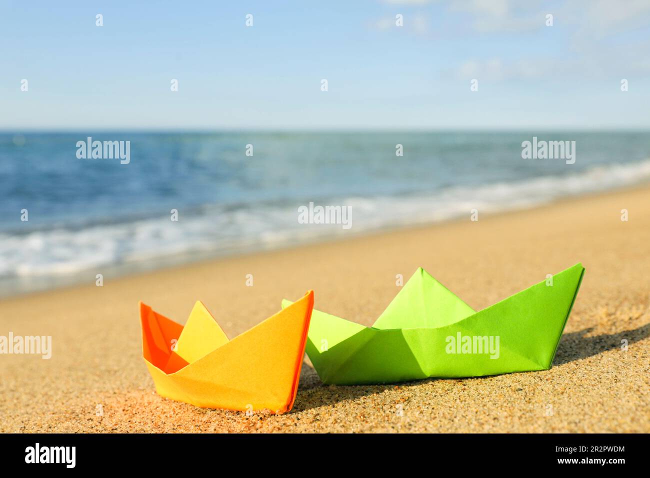 Light green paper boats hi-res stock photography and images - Alamy