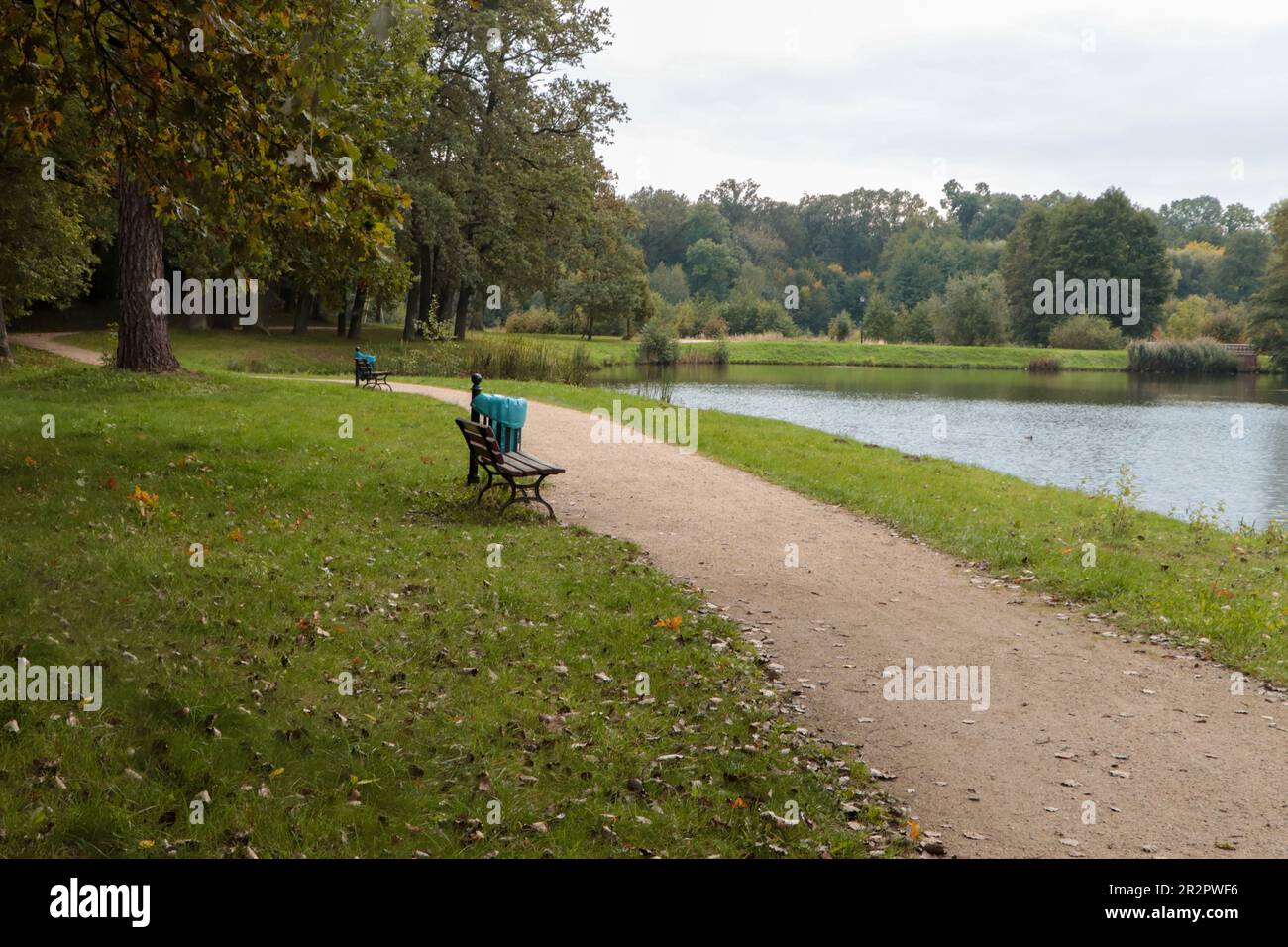 Pathway in beautiful public city park near river Stock Photo - Alamy