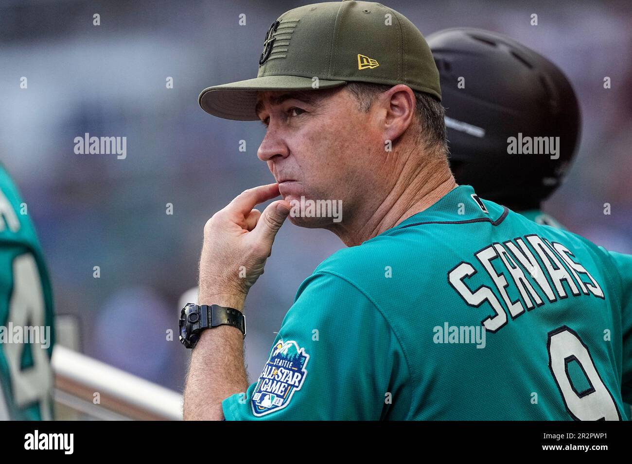 Seattle Mariners manager Scott Servais looks on from the dugout during ...