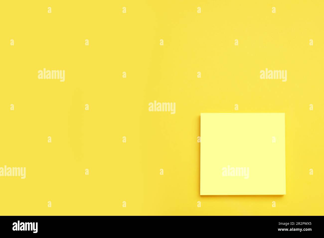 Paper note on yellow background, top view. Space for text Stock Photo ...