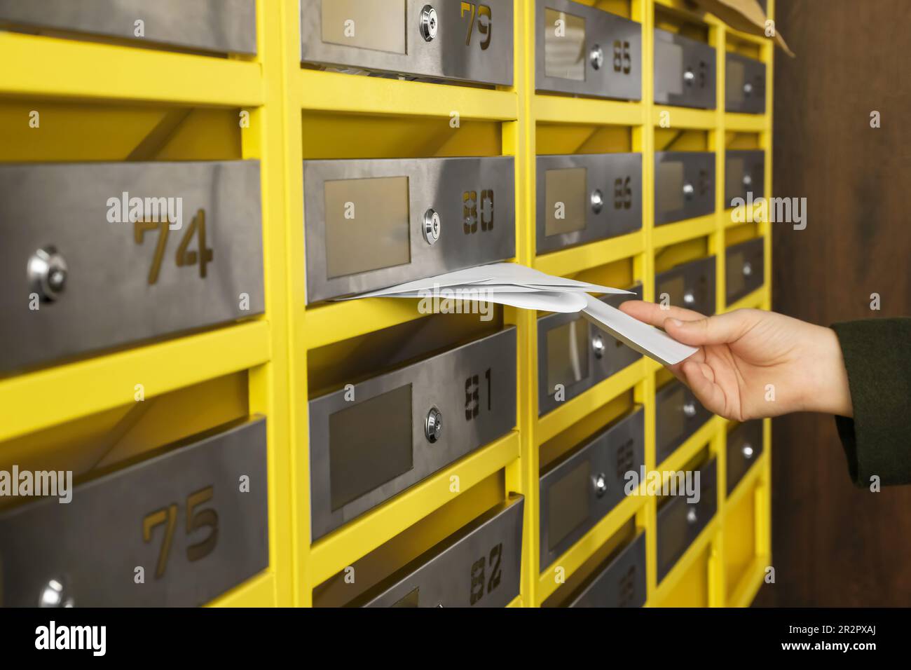 Taking mail out of post office box hi-res stock photography and images ...