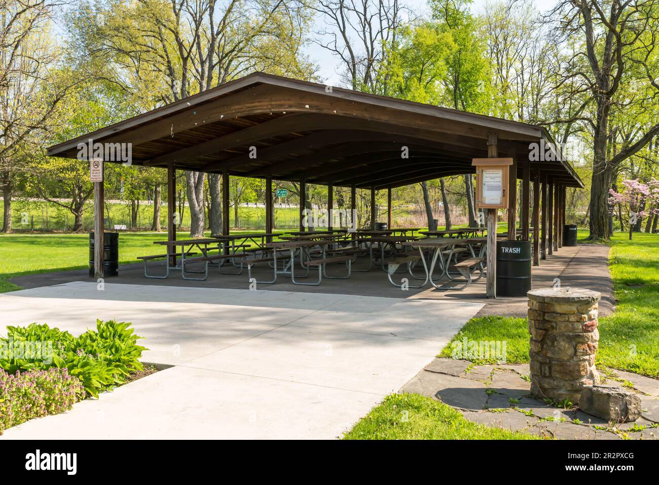 A covered space with picnic tables in Betts Park in Warren ...