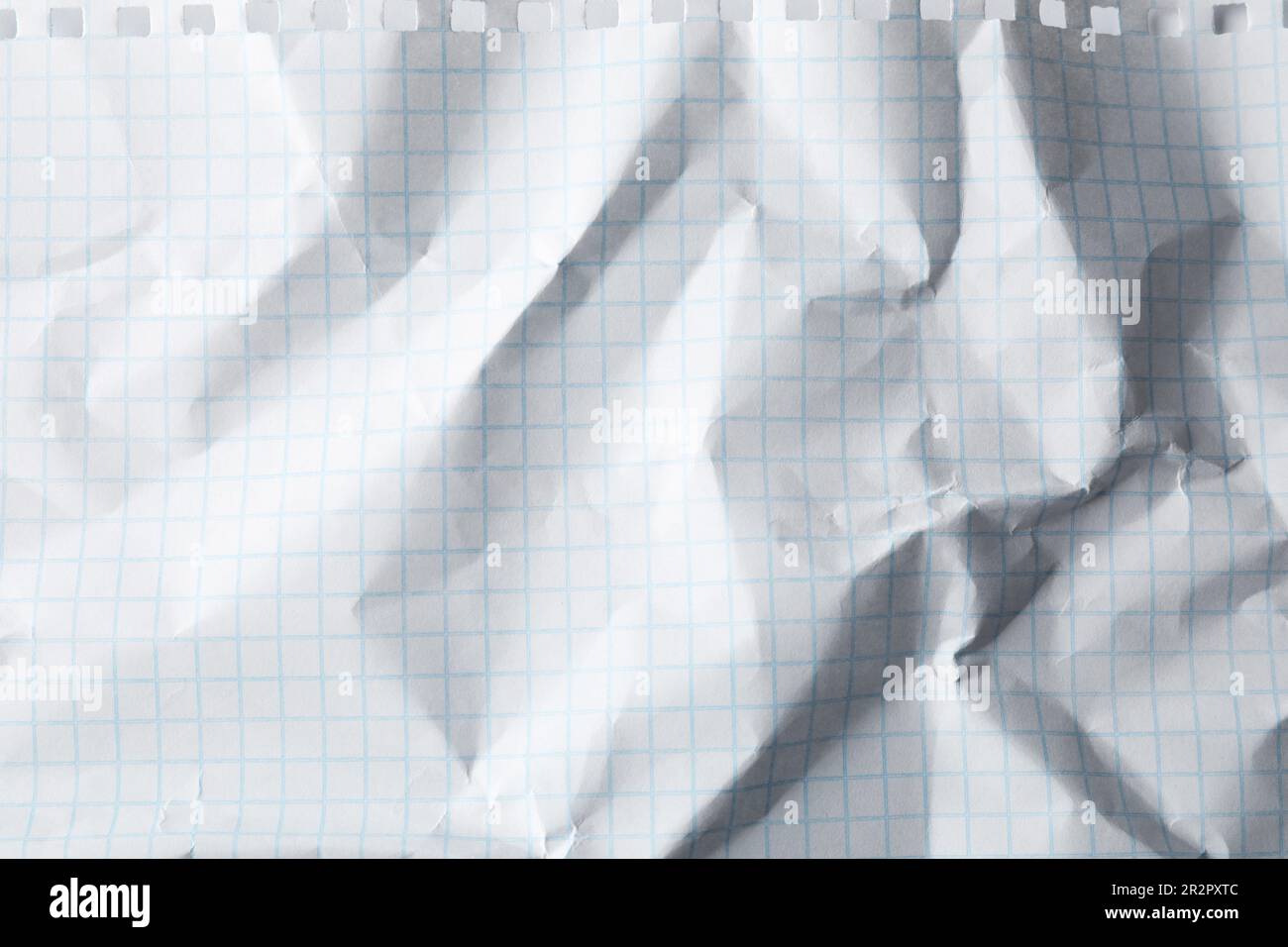 Crumpled sheet of paper as background, closeup Stock Photo - Alamy