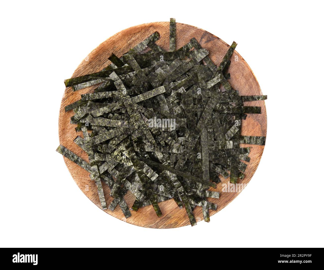 Wooden board with chopped crispy nori sheets isolated on white, top ...