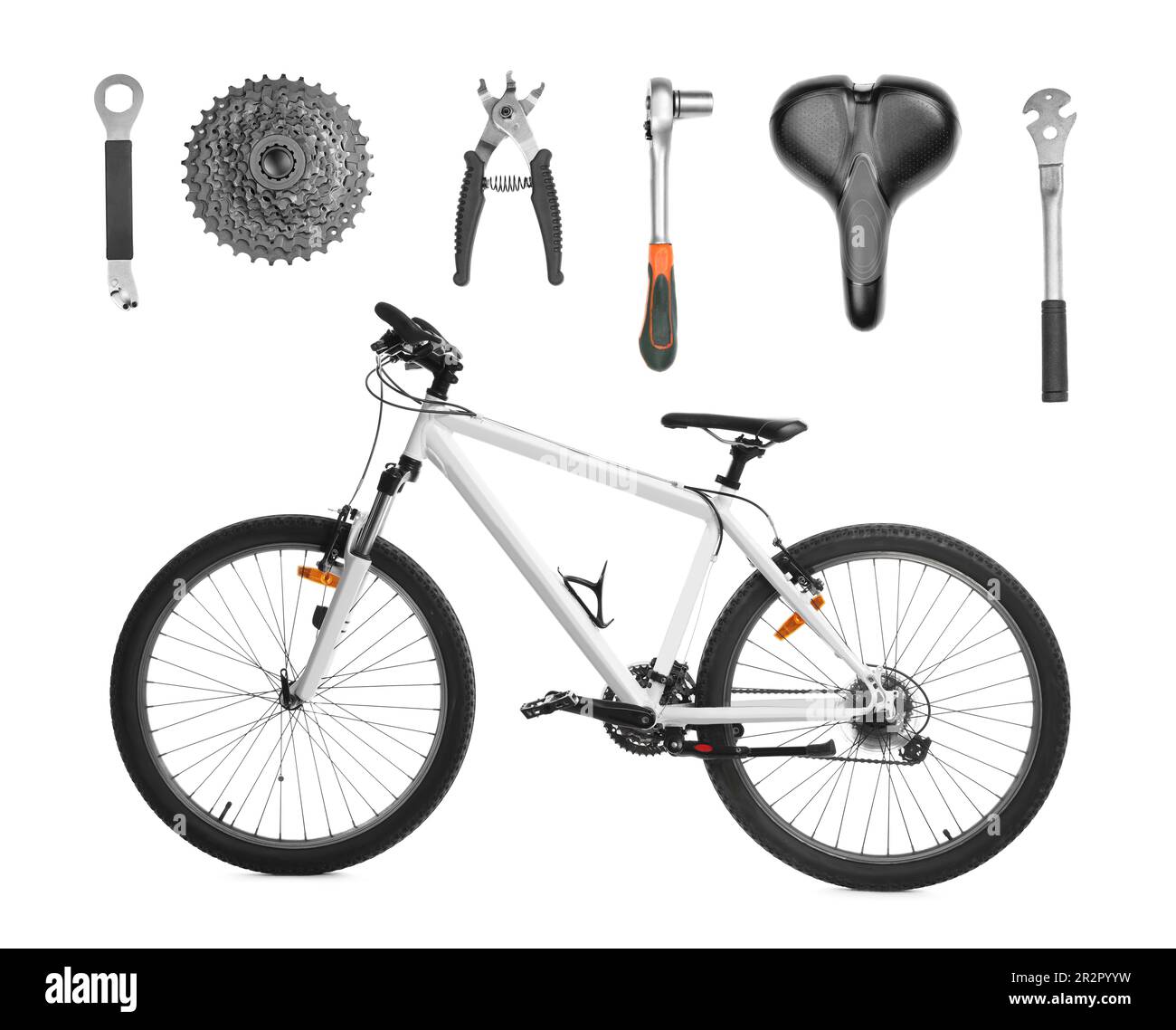 Modern bicycle, its details and tools for repair on white background ...