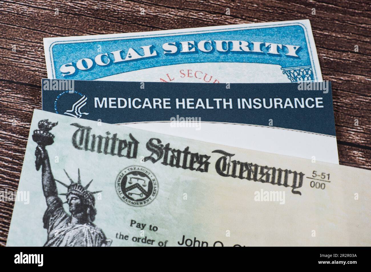 SSN and Medicare cards with US Treasury Check Stock Photo - Alamy