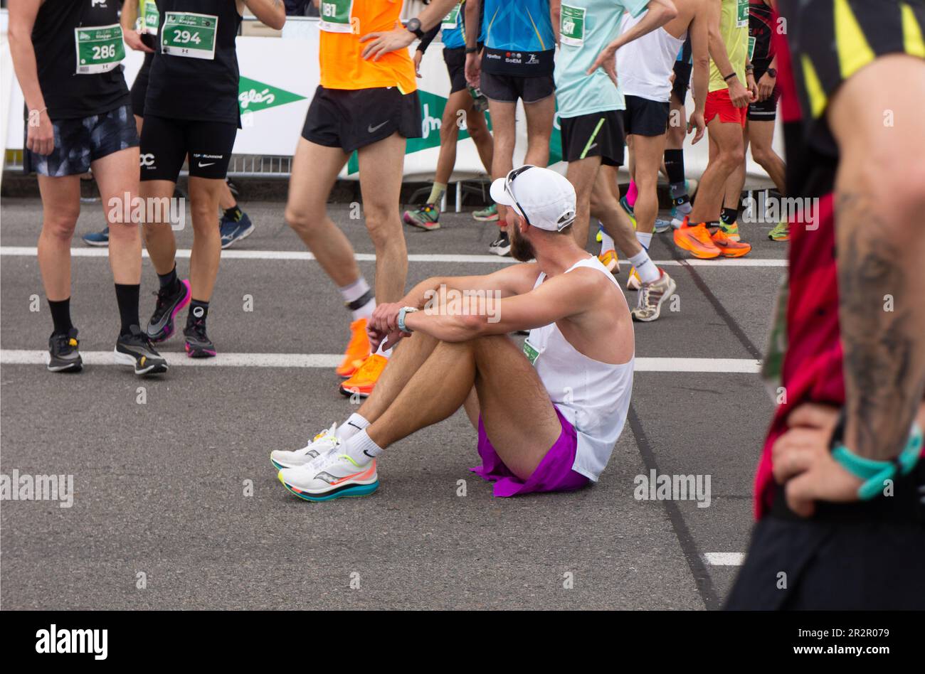 A runner collapses after a race in Barcelona, Spain Stock Photo - Alamy