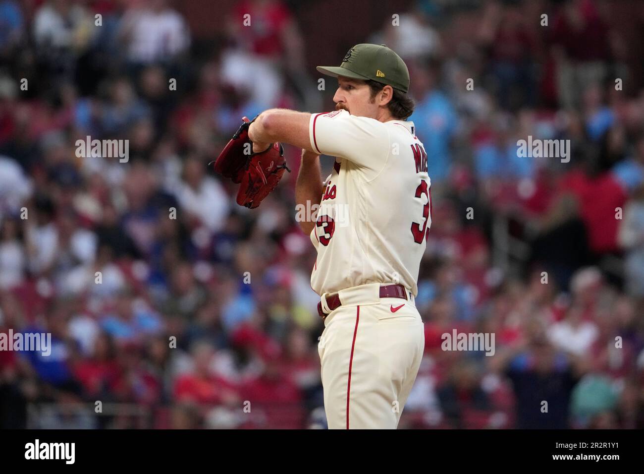 St. Louis Cardinals starting pitcher Miles Mikolas pauses after giving ...