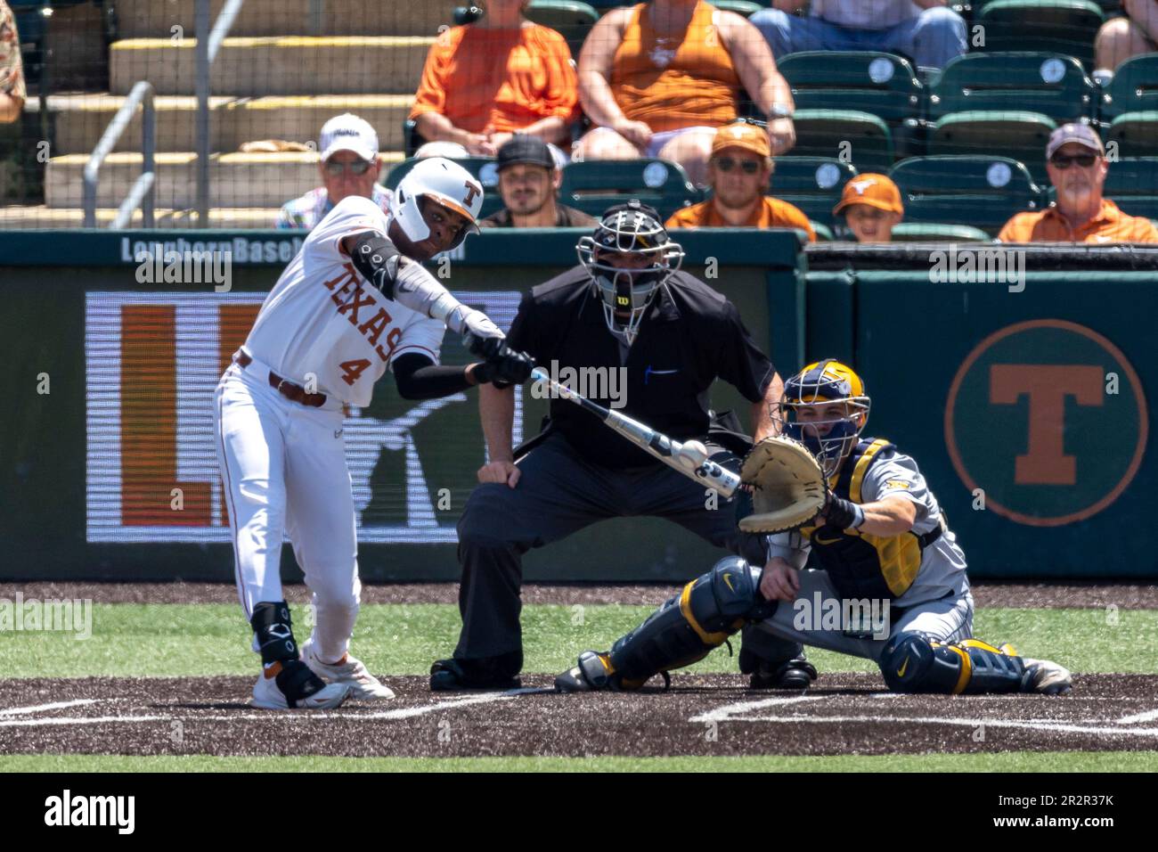 AUSTIN, TX - MAY 20: Texas outfielder Porter Brown (4) gets a hit during the Big 12 Conference ...