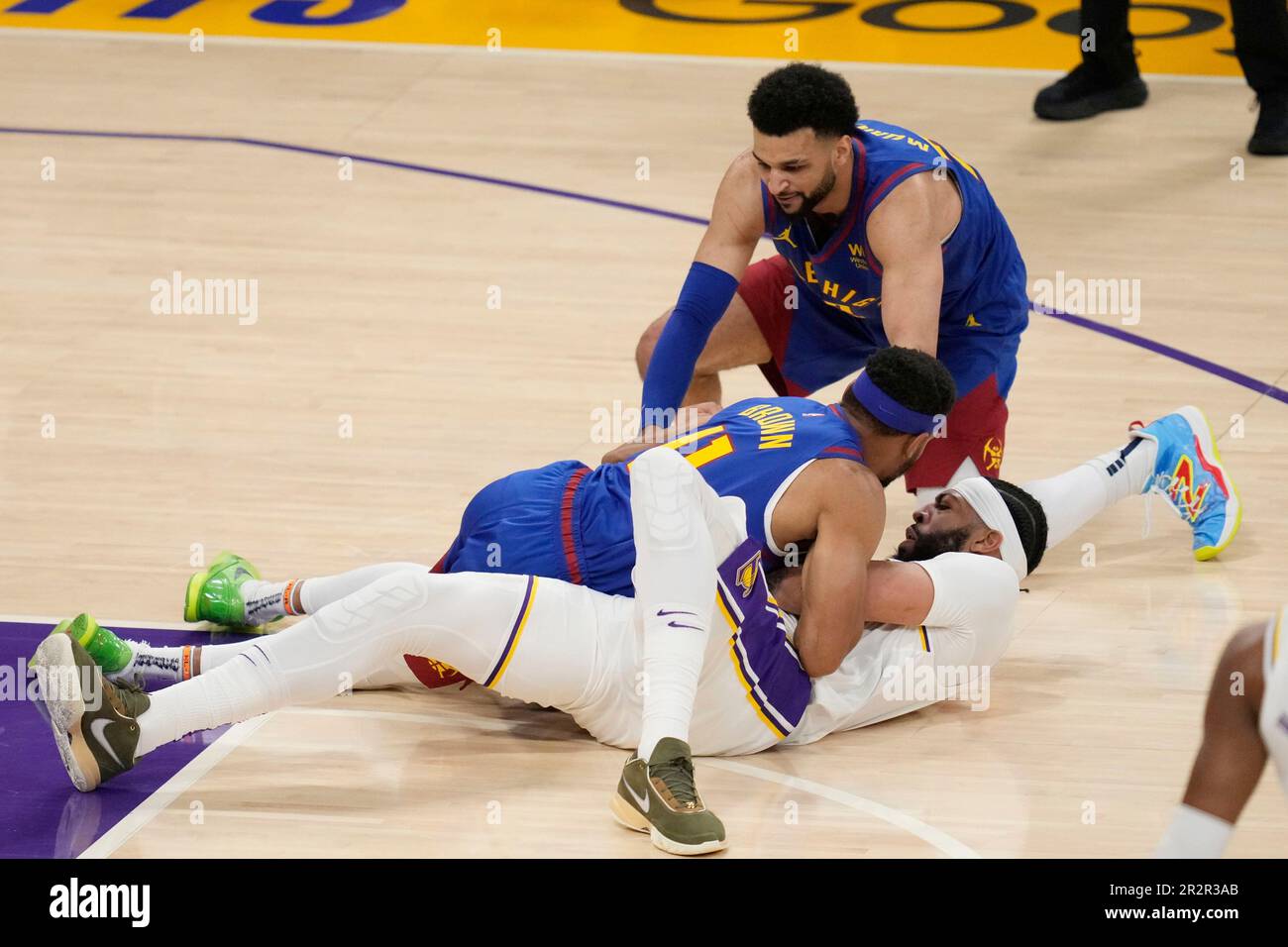 Los Angeles Lakers forward Anthony Davis, bottom, works for a loos ball ...
